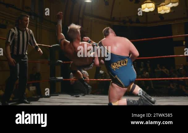 Pro Wrestling Match (Slow Motion): Wrestler Hits Running Knee to Face ...
