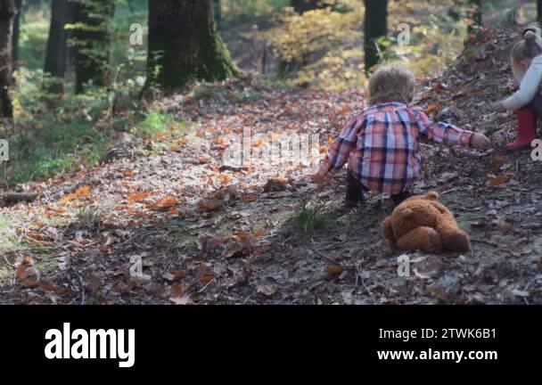 First love. Kids in the forest. Children in the forest. Girl and boy ...