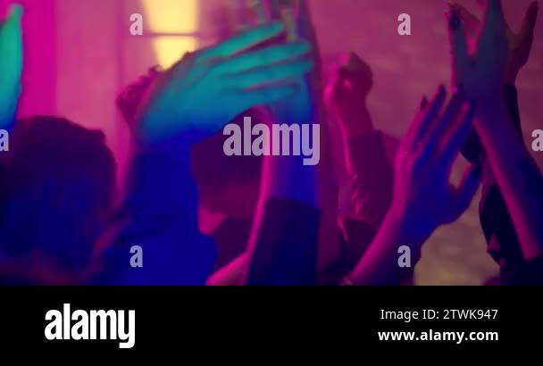 Hands at a Party/Put your hands in the air! Friends having fun at a ...