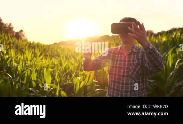 Smart farming with IoT, futuristic agriculture concept : Farmer wears ...