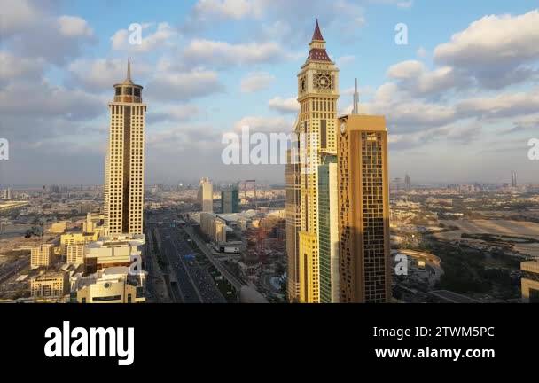 Scenic Dubai downtown architecture in the evening. Rooftop skyline with ...