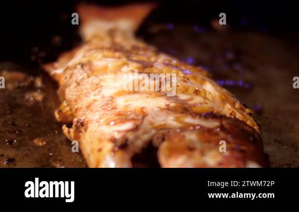 tasty sea fish with golden crunchy crust fries in pan Stock Video ...
