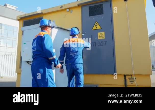 engineers open door enter transformer box premises with equipment Stock ...