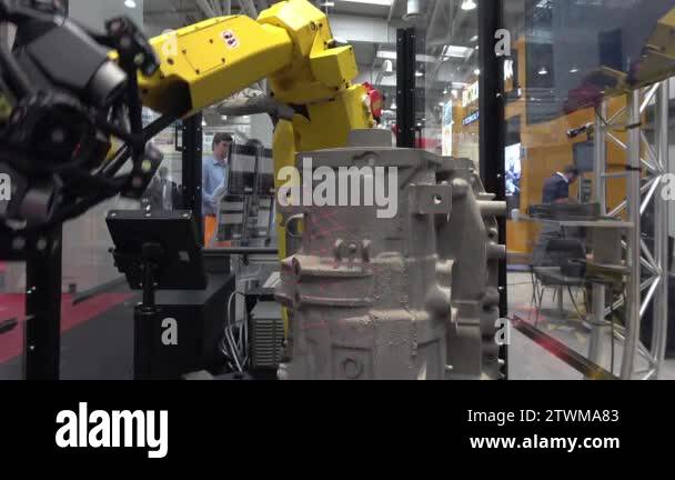 Robot arm with MetraSCAN 3D optical CMM scanning system on Messe fair ...