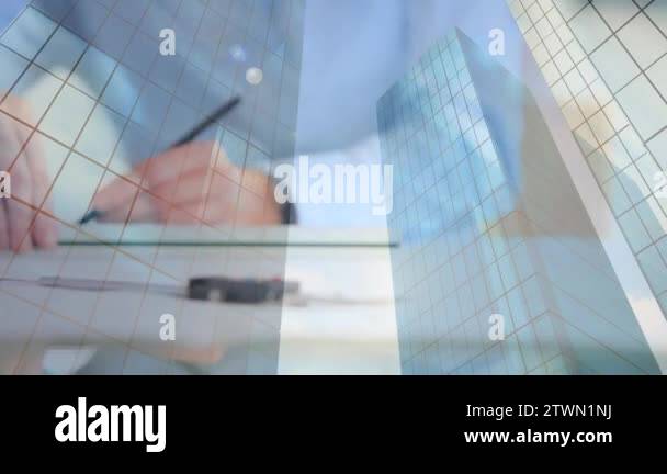 Digital composite of an architect drafting building plans with images ...