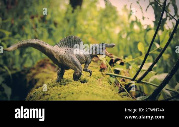 The largest carnivorous dinosaur spinosaurus, childrens toy, come to life Stock Video Footage ...