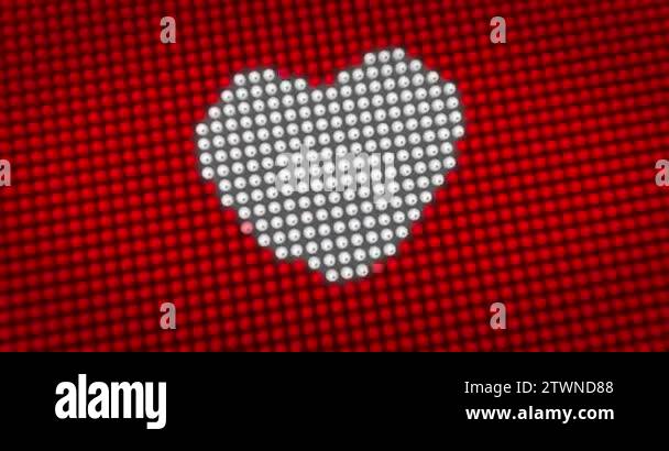 White heart symbol beating on large LED display with big pixel. Heart ...