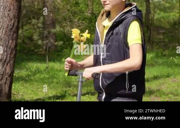 Boy on kick scooter Stock Videos & Footage - HD and 4K Video Clips - Alamy