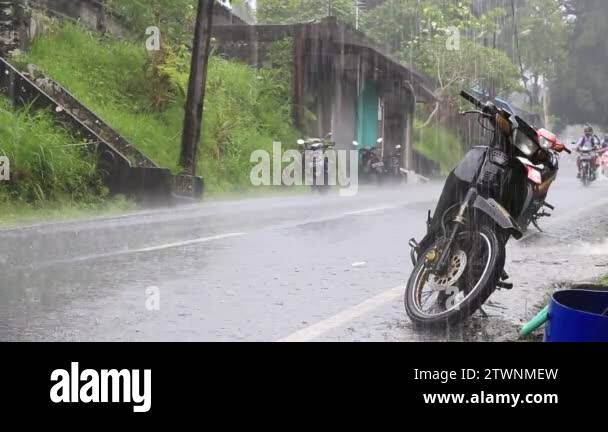 UBUD, BALI, INDONESIA - JANUARY 04, 2018 : Traffic along a typical ...