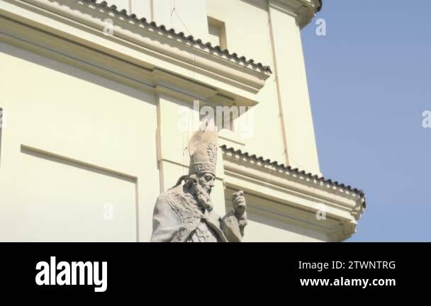 Baroque sandstone statue, Christian holy saint. Beautiful sunny day ...