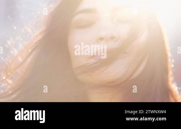 peaceful beauty relaxed woman bask sun hair wind Stock Video Footage - Alamy