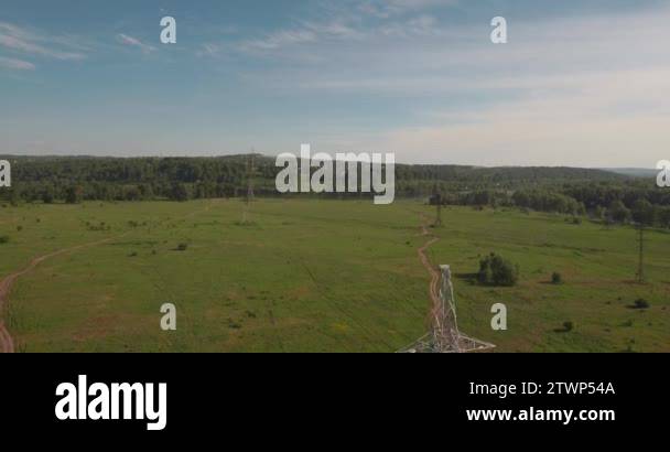 Top view, AERIAL: power lines. Electric high-voltage supports ...