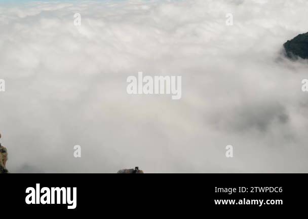 A huge number of clouds under the mountain, view from a very high ...