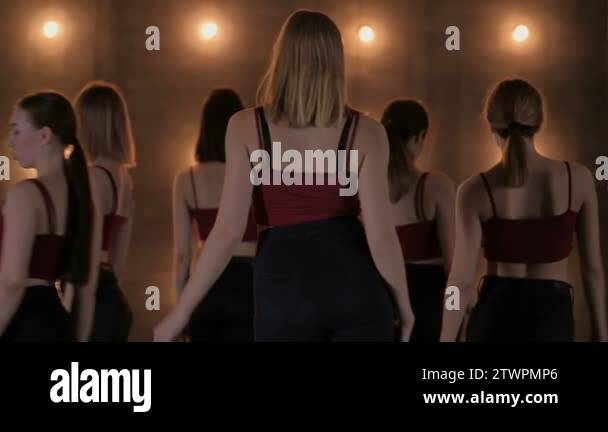 silhouettes of dancing girls. go-go dance. Closeup dance performance of ...