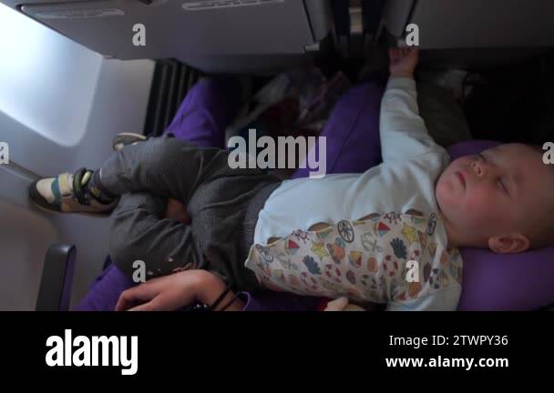 Boy sleeping in plane Stock Videos & Footage - HD and 4K Video Clips ...
