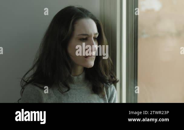 Woman broken window Stock Videos & Footage - HD and 4K Video Clips - Alamy