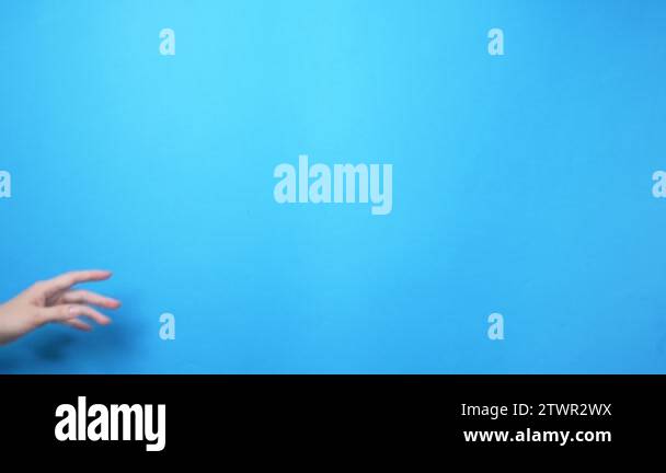 Two male and female hands reaching out to each other, almost touching ...