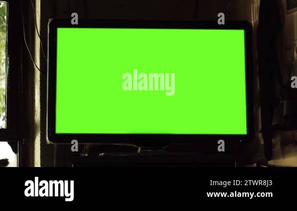 Green Screen Television in a Bar. Ready to replace green screen with ...