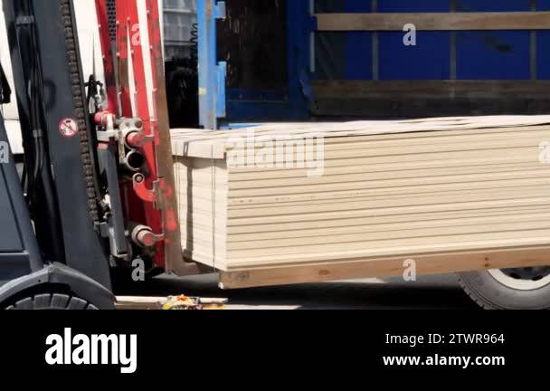 close-up. warehouse. unloading of the truck. unloading goods from the ...