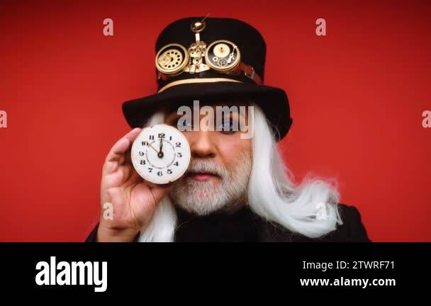 Watchmaker, time keeper, time line. Time wizard. Old man with watch ...