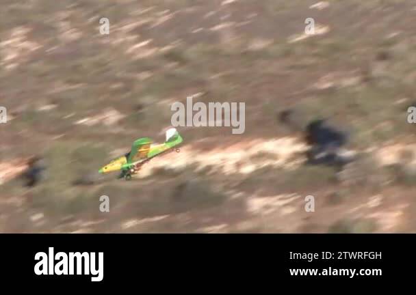Fire fighting plane spraying fire extinguisher on burning forest, Mount ...