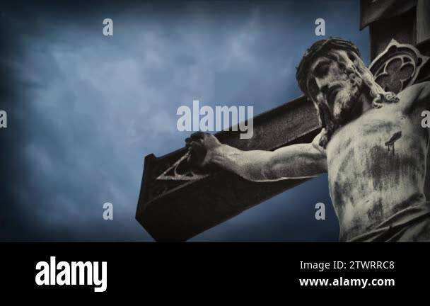 Crucifixion. Christian cross with Jesus Christ statue over stormy clouds time lapse Stock Video ...