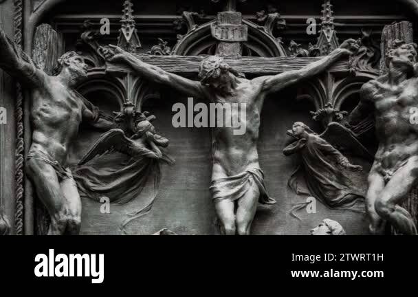 Beautiful Duomo di Milano iron gates decor in close up.Jesus Christ ...