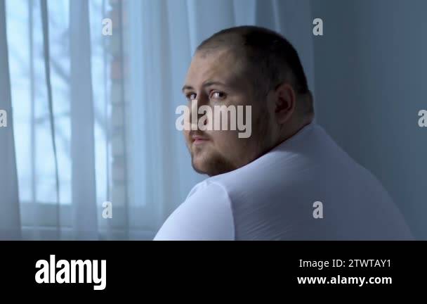Sad obese man Stock Videos & Footage - HD and 4K Video Clips - Alamy