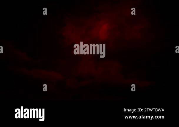 Scary Red Moon Comes Out From Behind Clouds Stock Video Footage - Alamy