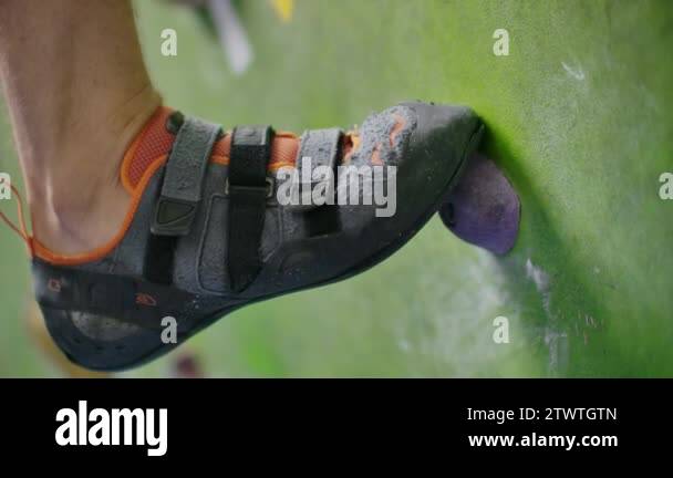 Boulder climber man exercising at indoor climbing gym wall. Training ...