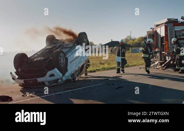 On the Car Crash Traffic Accident Scene: Paramedics and Firefighters ...