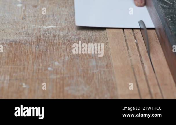 Carpenter at work. Old Chinese carpenter and wood worker cutting ...