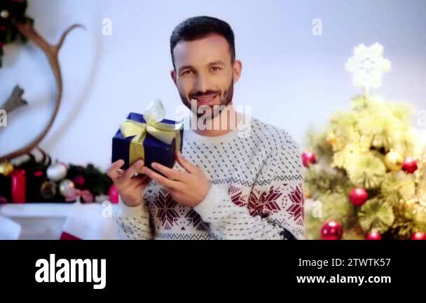Man holding present Stock Videos & Footage - HD and 4K Video Clips - Alamy