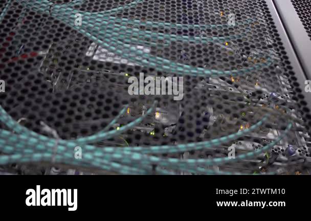 Server rack flashing led lights are in a modern data center are located ...