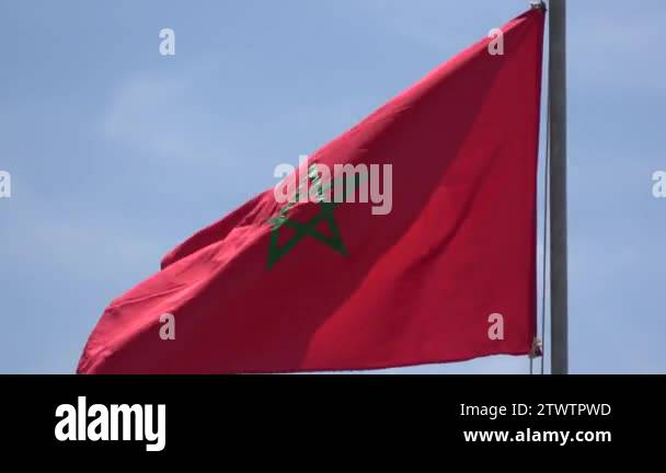 4K. Ultra HD. Beautiful big flag of Morocco waving in the wind. Blue ...