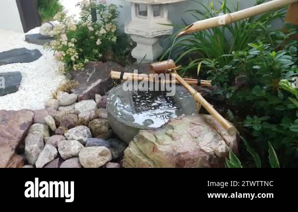 Water Dripping In Japanese Garden Stock Video Footage - Alamy