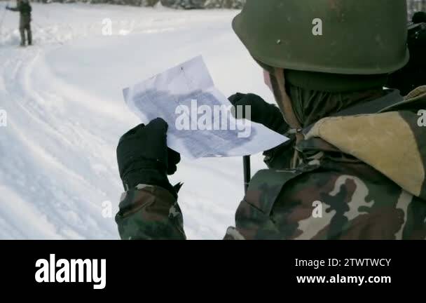 Soldier with weapons in cold forest. Winter warfare and military ...