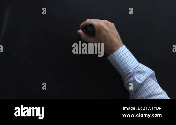 Teacher drawing question marks on blackboard, concept of perplex and ...