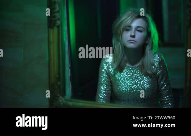 Drunk woman looking in mirror, vomiting after night club party ...