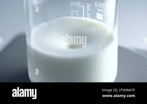 Laboratory experiments. Milk testing. Reagent and milk mixing reaction ...