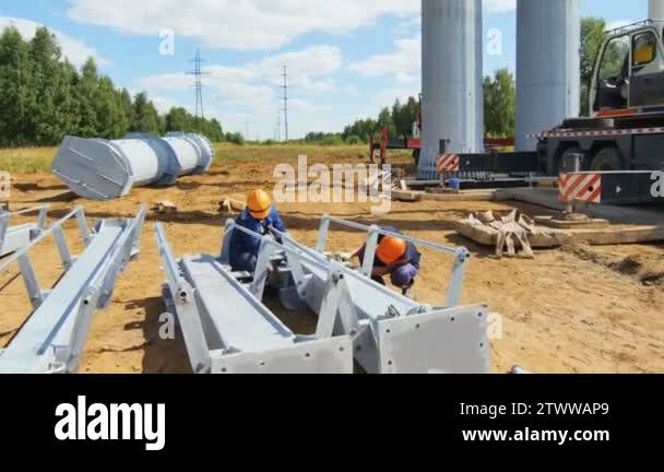 Transformer substation building site workers Stock Videos & Footage ...