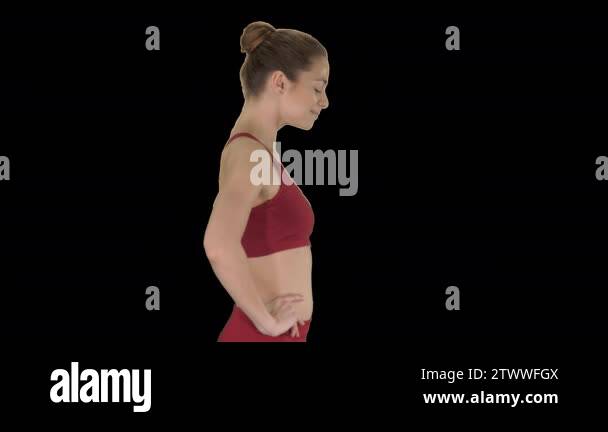 Female walking and doing neck stretching exercise to release build up ...