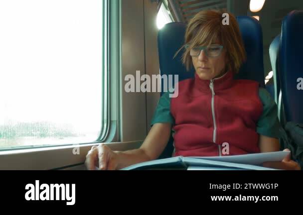 People reading paper train Stock Videos & Footage - HD and 4K Video ...