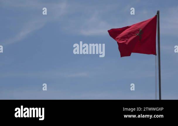 4K. Ultra HD. Beautiful big flag of Morocco waving in the wind. Blue ...