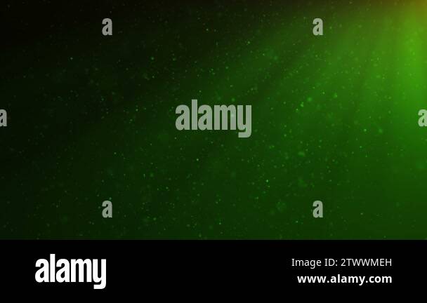 Abstract motion background of shining, sparkling, green particles ...