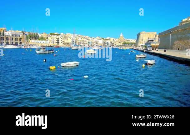 The tall wall of Birgu fortress and the hornworks of the Post of ...