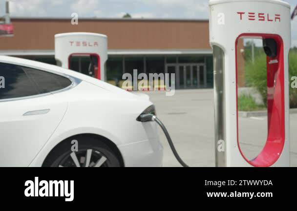 Tesla autonomous car - JULY 10 2016: White Tesla autonomous electric ...