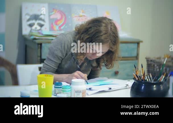 art school, creativity and people concept - group of students with ...