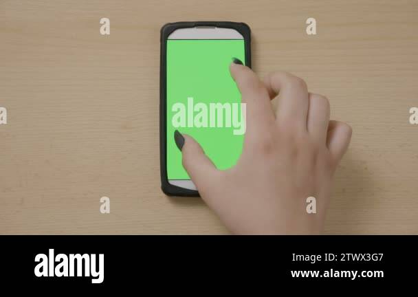 Woman hand making zoom gestures scrolling and sliding multimedia on ...