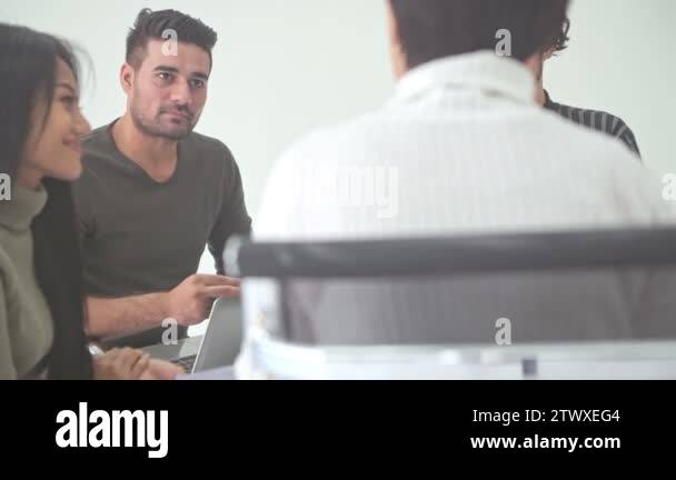 Business meeting. Small start up business meeting in room. Asian team ...
